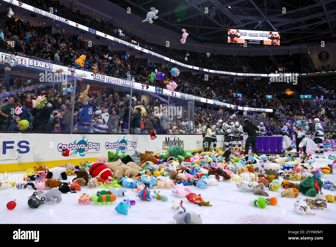 CLEVELAND, OH - DECEMBER 22: Fans throw stuffed animals to the ice ...