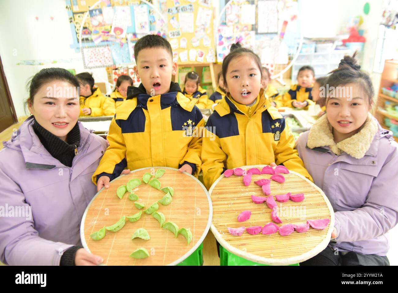 Children at a kindergarten learn to make dumplings for the Dongzhi ...