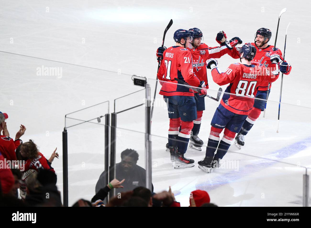 Washington Capitals center Aliaksei Protas (21) celebrates after his ...