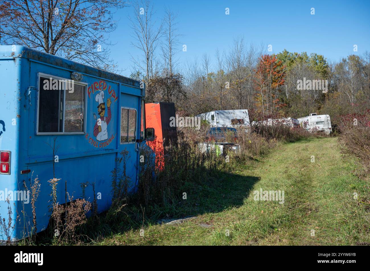 Old food truck and other vehicles in junkyard Stock Photo - Alamy