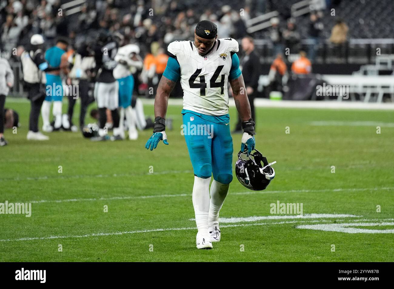Jacksonville Jaguars defensive end Travon Walker walks off the field ...