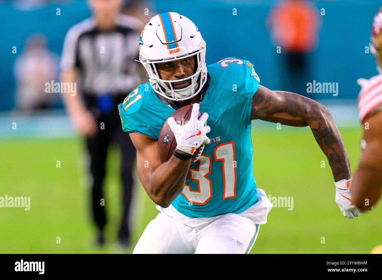 Miami Dolphins running back Raheem Mostert (31) runs with the ball during an NFL football game ...