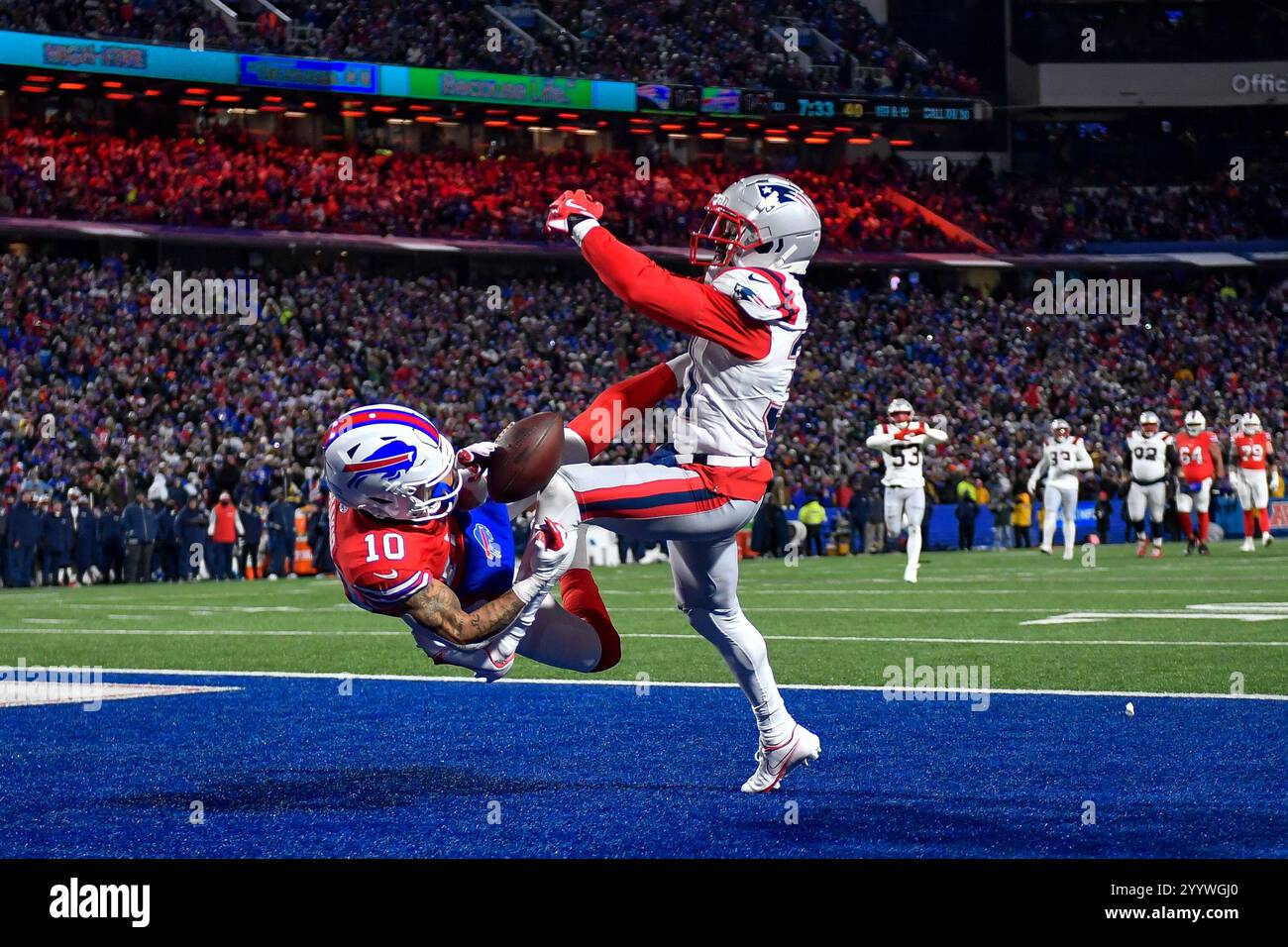 New England Patriots cornerback Jonathan Jones, right, breaks up a pass ...