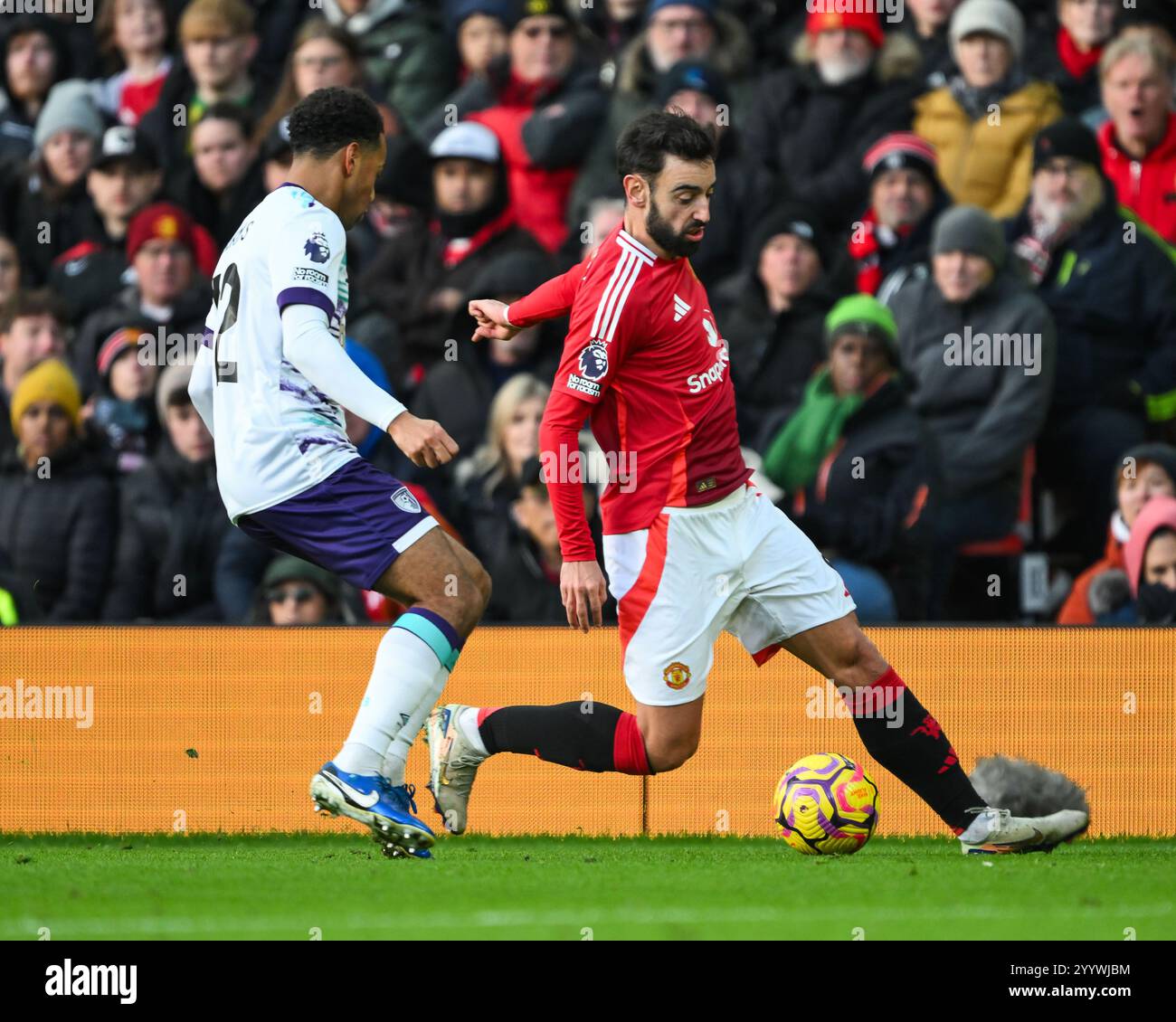 Bruno Fernandes of Manchester United makes a break with the ball past ...