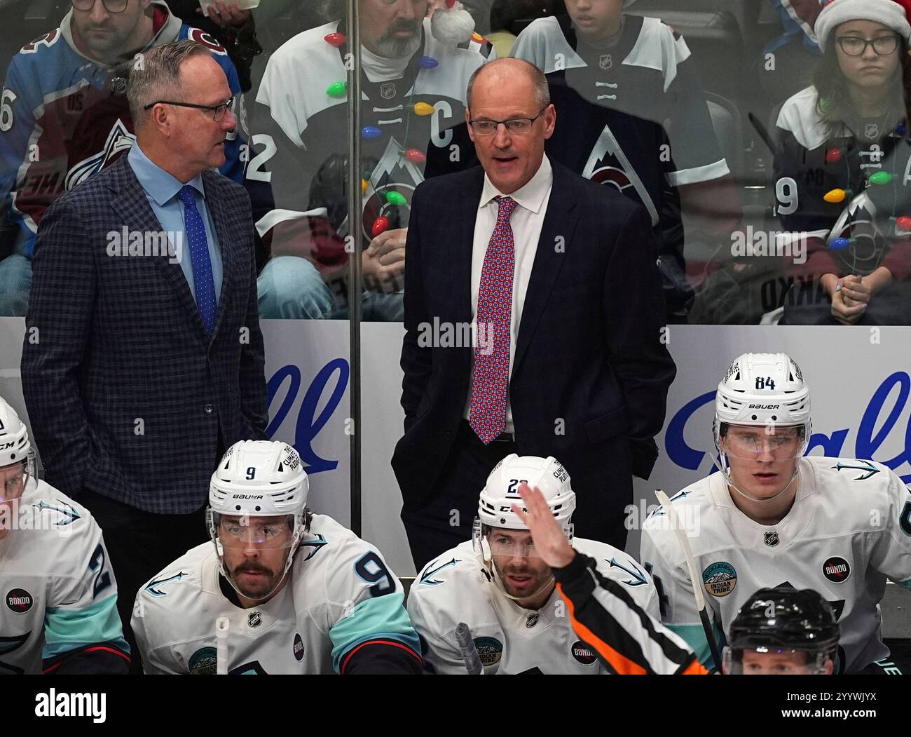 Seattle Kraken head coach Dan Bylsma, top right, looks on with ...