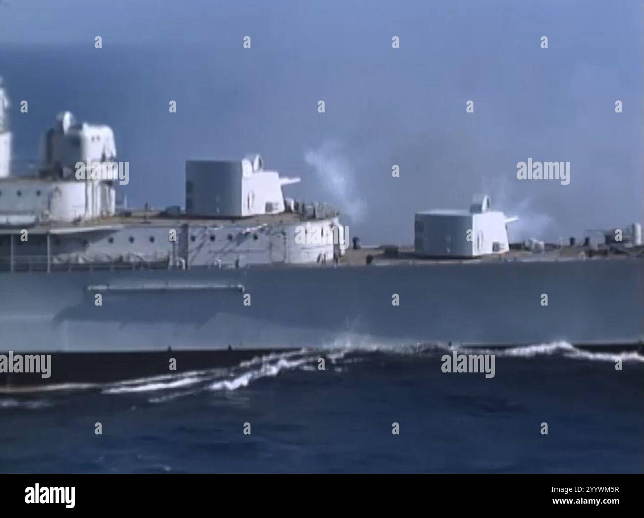 Dutch cruiser Hr.Ms. De Zeven Provinciën (C802) firing its 152mm guns ...