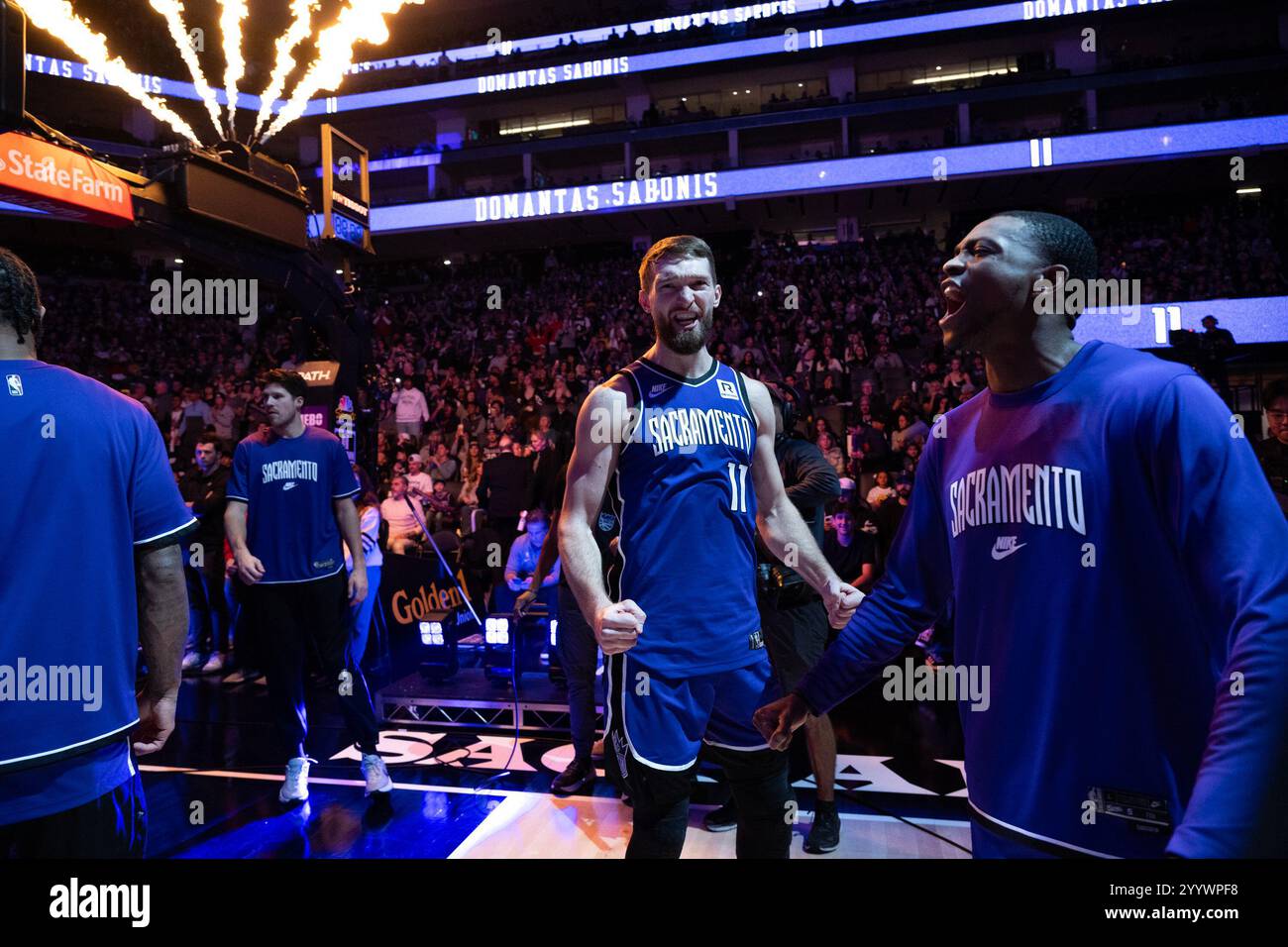 Sacramento, Ca, USA. 22nd Dec, 2024. Sacramento Kings guard De'Aaron Fox (5) and center Domantas ...