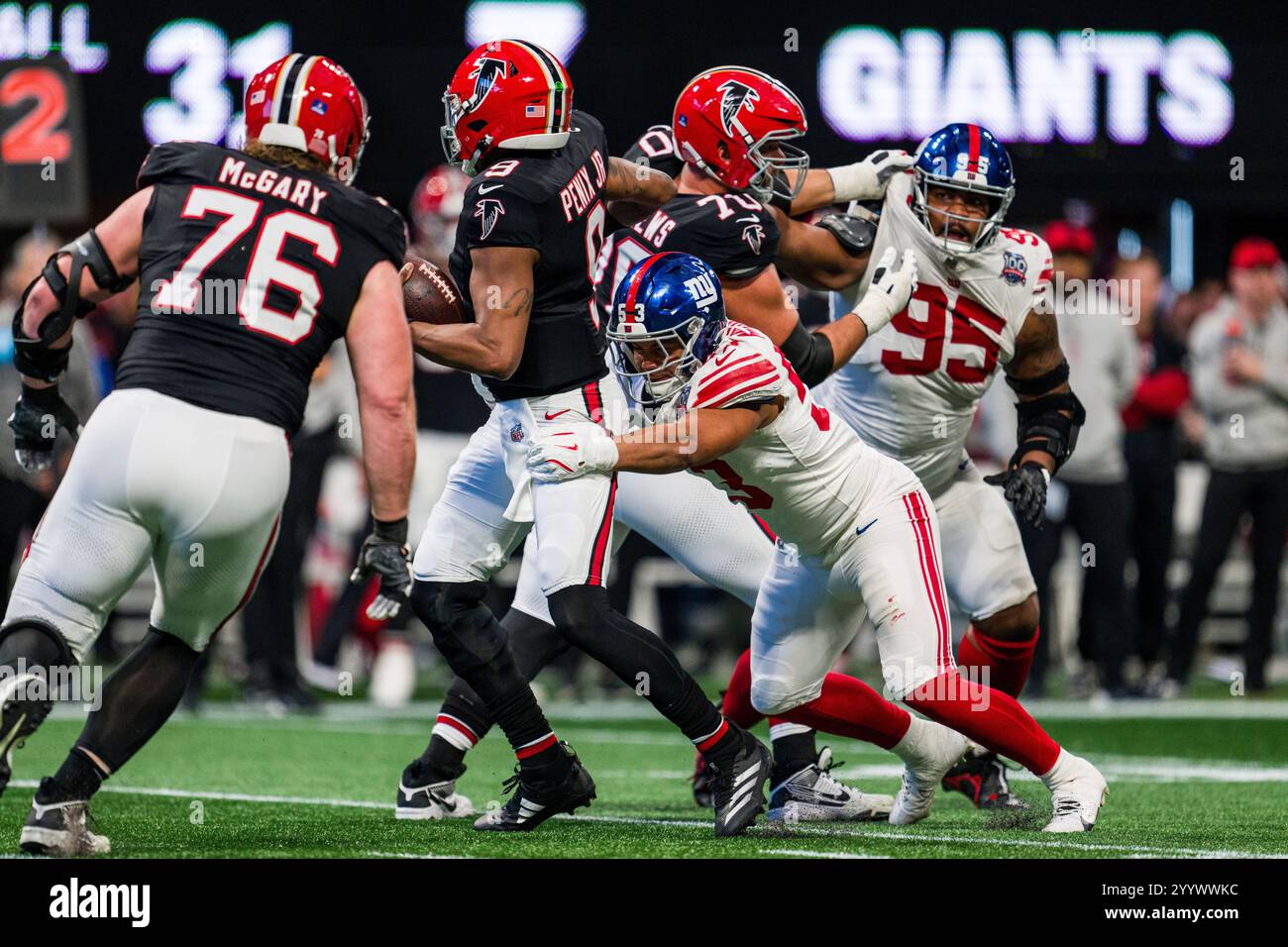 New York Giants linebacker Darius Muasau (53) hits Atlanta Falcons ...