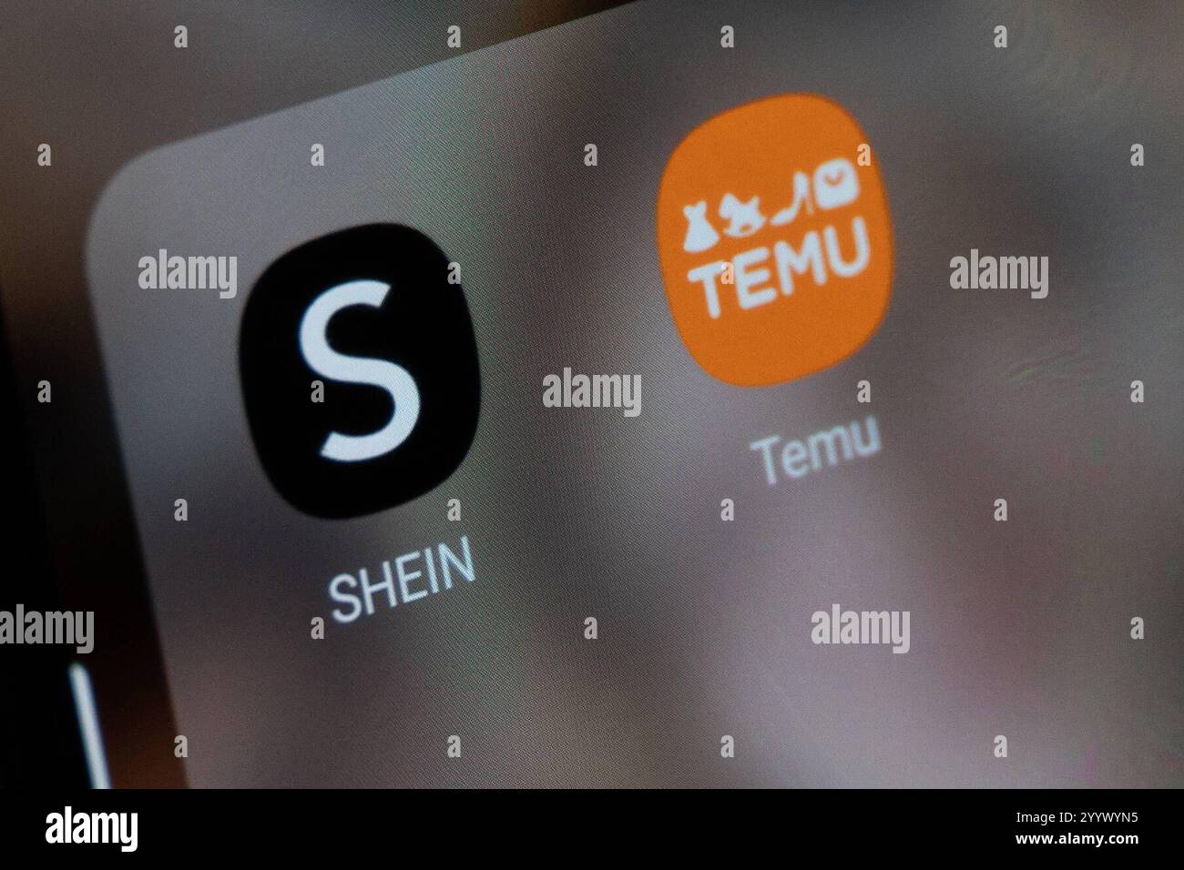 Shein and Temu icons are seen displayed on a phone screen in this ...