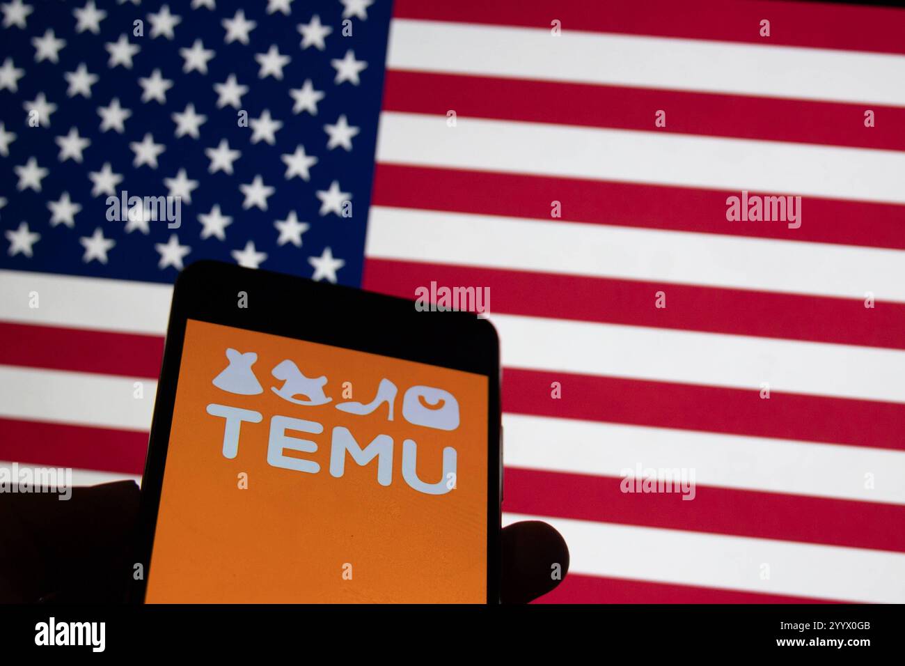 In this photo illustration, a Temu logo seen displayed on a smartphone ...