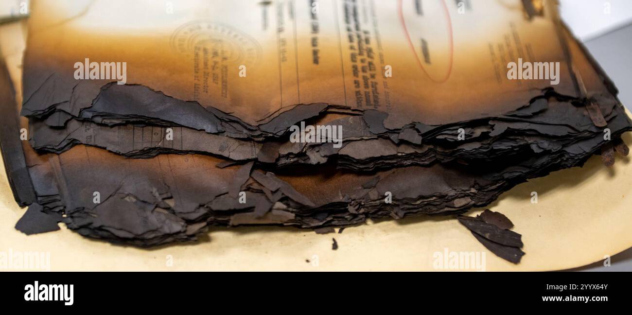 Edge-on detail of burned file Stock Photo - Alamy