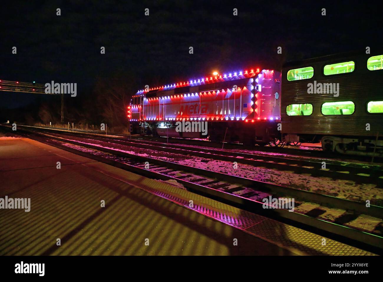 Naperville, Illinois, USA. A Metra commuter locomotive decorated with ...