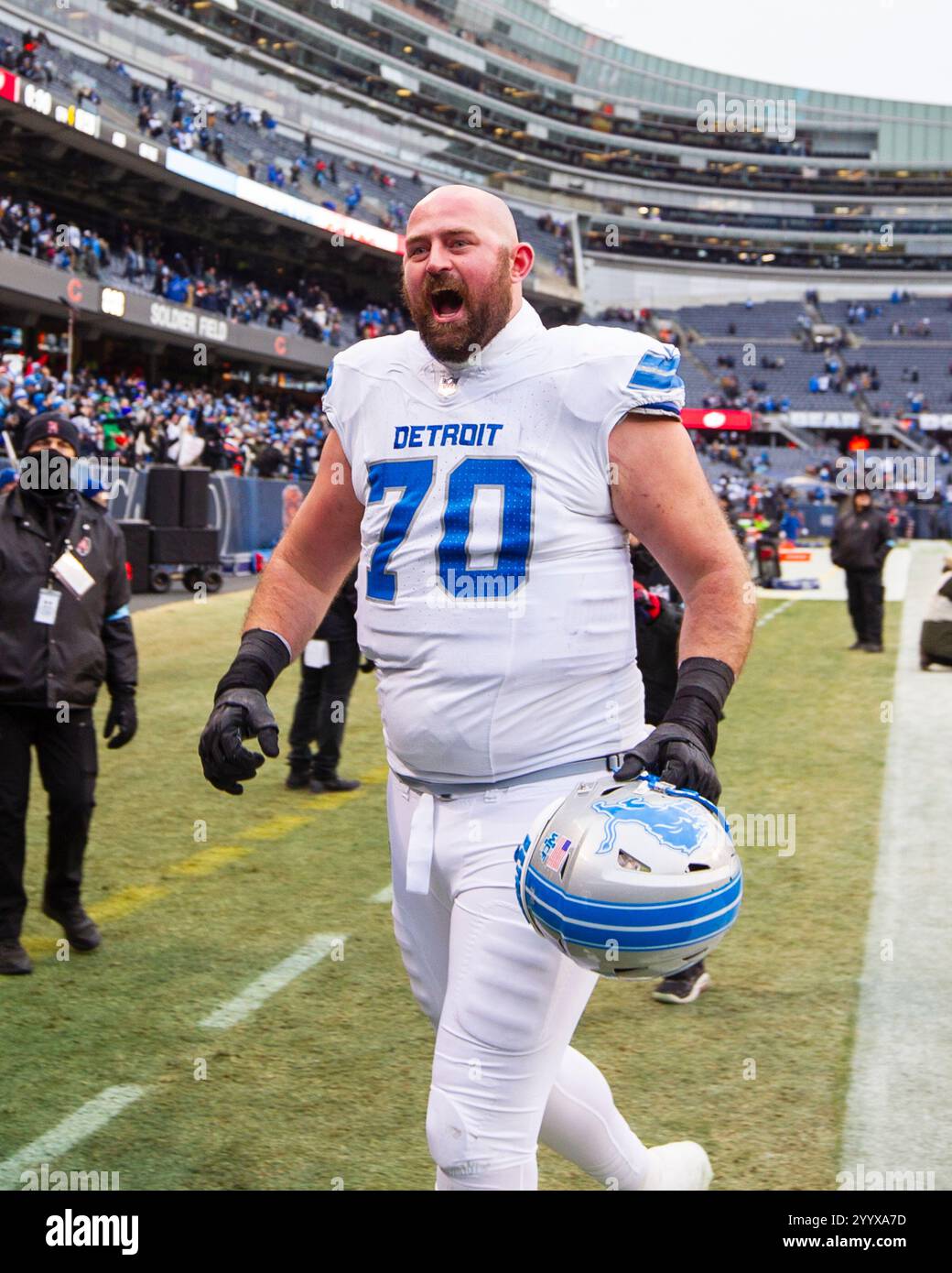 Detroit Lions Dan Skipper (70) acknowledges the Lions fans as he walks ...