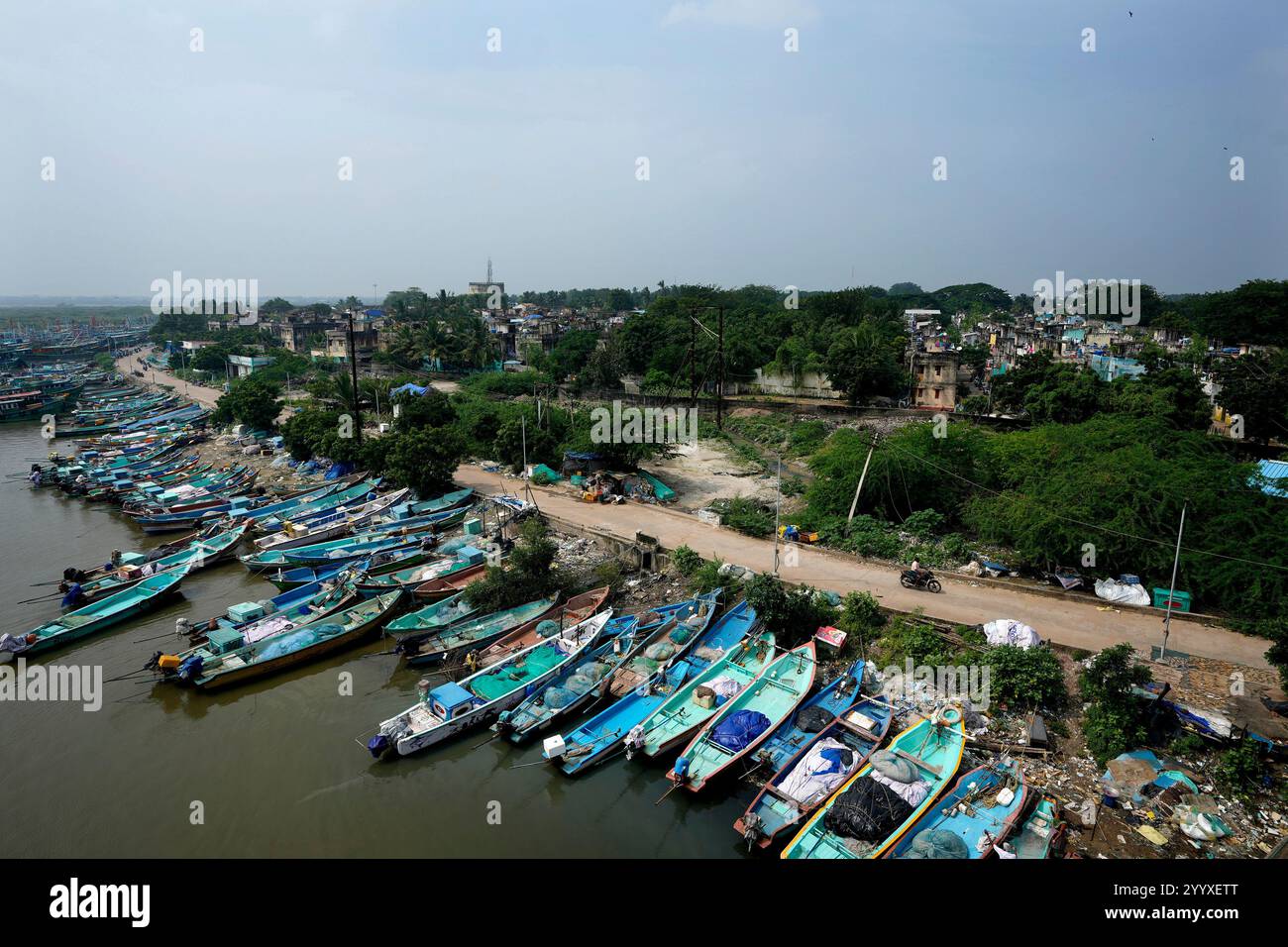 Boats of fishermen are anchored at a harbor in Nagapattinam, one of the ...