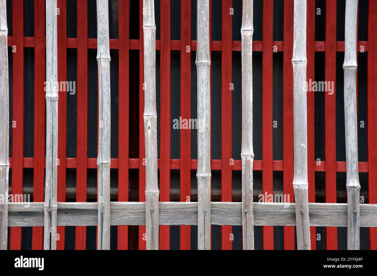 A combination of red architectural window lattice (Japanese koshi) and ...