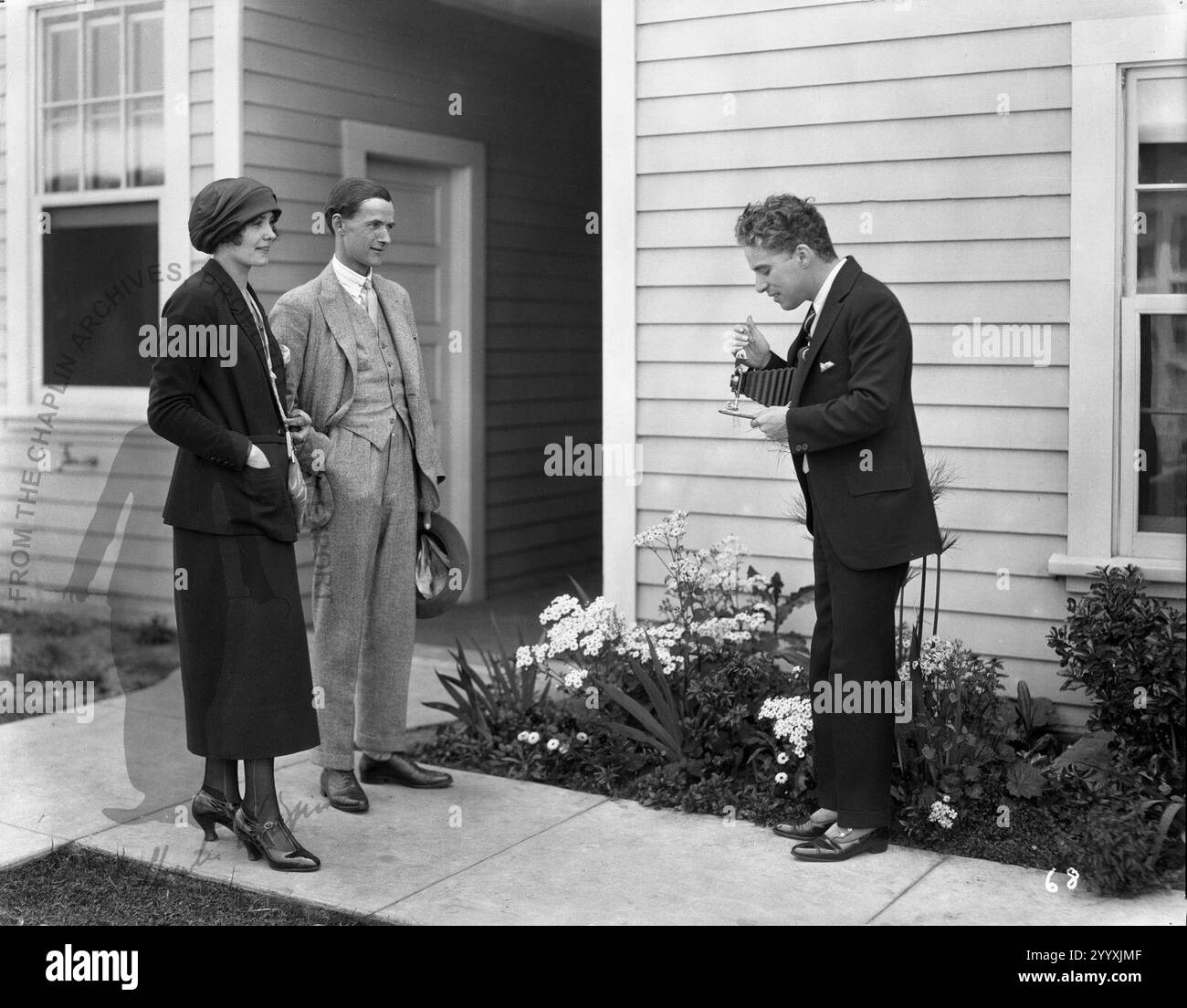 Edward Naylor-Leyland with his wife and Charlie Chaplin 1920 Stock ...