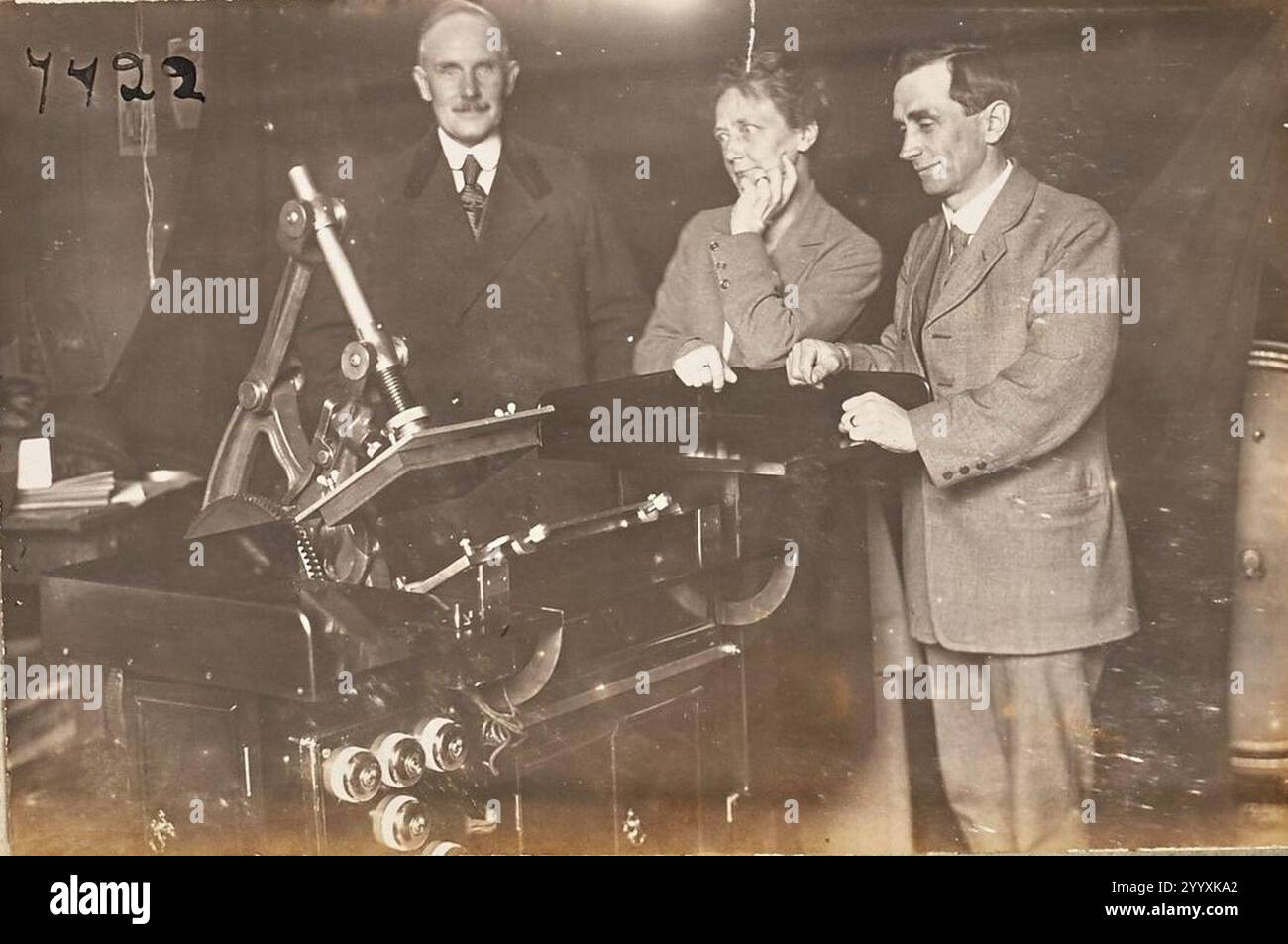 Edward Sankey (left) with the Sankey patent postcard printing machine ...