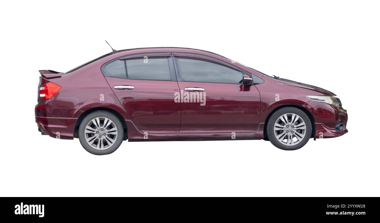 Side view of red sports sedan car is isolated on white background with ...