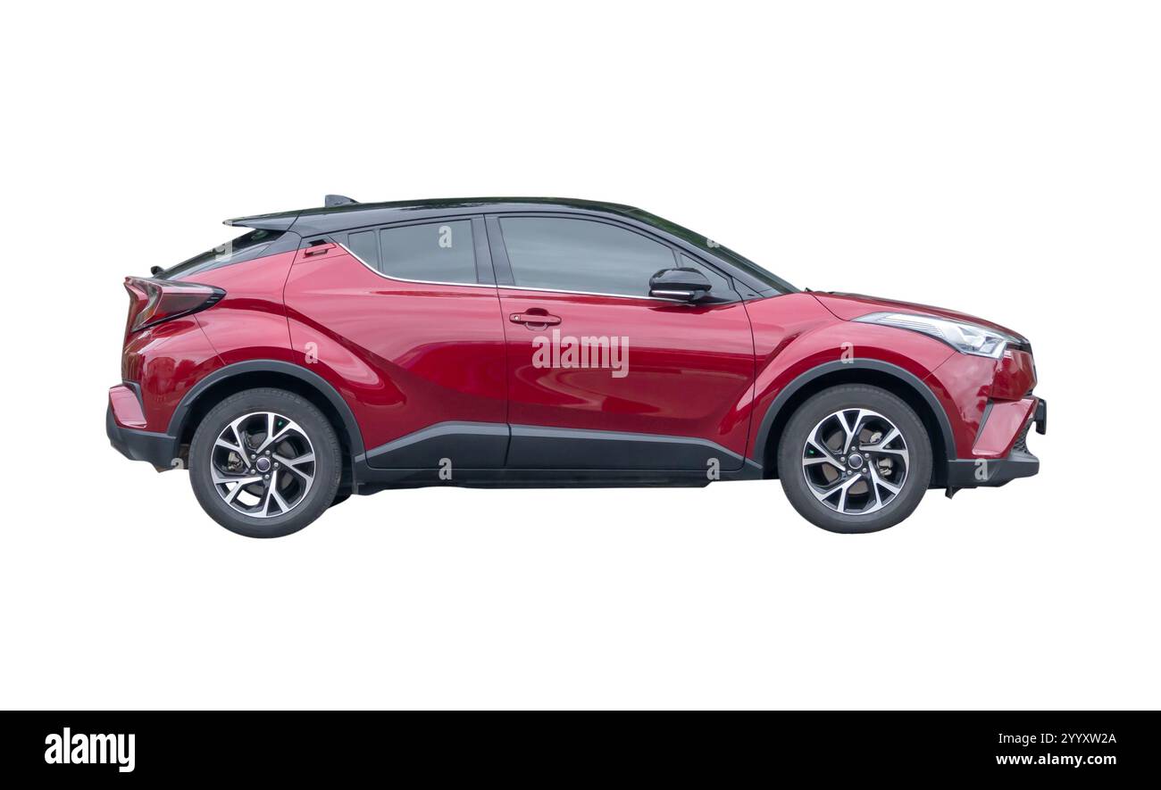 Side view of red hatchback car is isolated on white background with ...