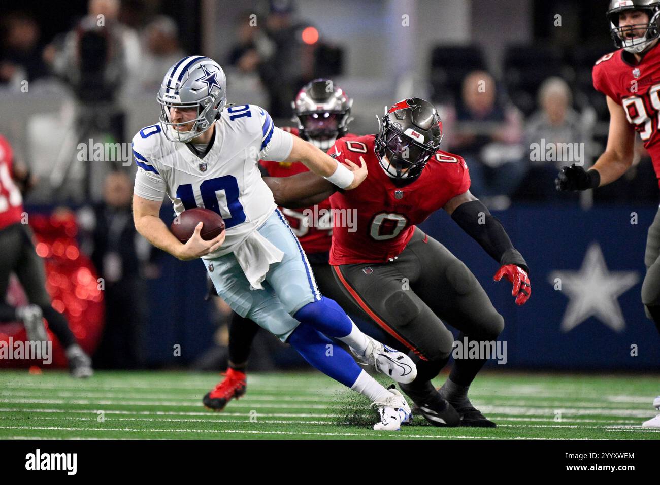Dallas Cowboys quarterback Cooper Rush (10) avoids a pressure by Tampa ...