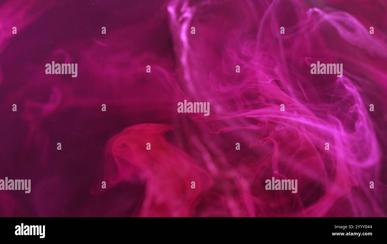 Colorful ink. Water abstraction. Defocused bright pink paint mist smoke ...