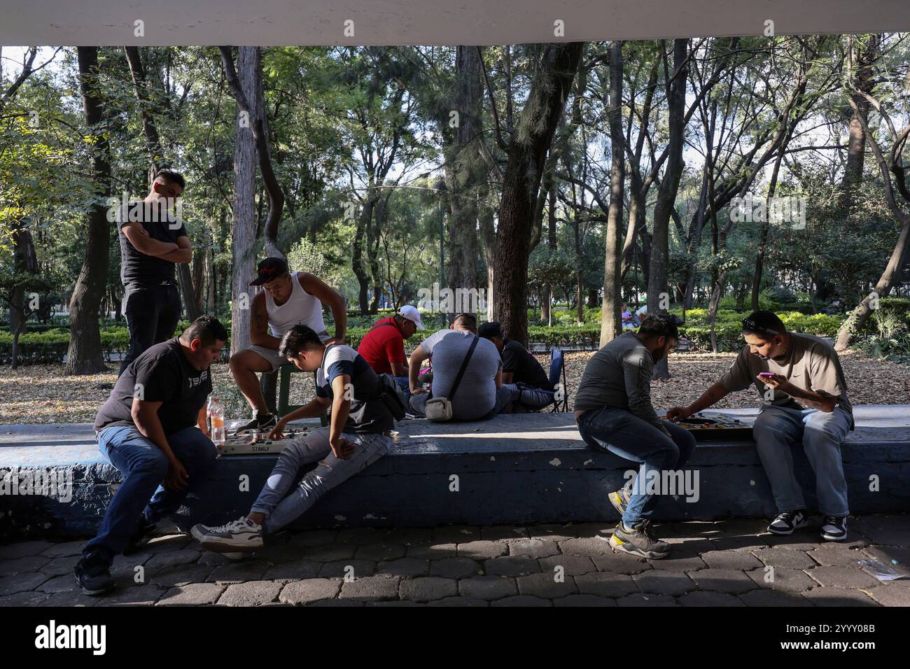 Participants play Poleana, a board game invented in prison, during a ...