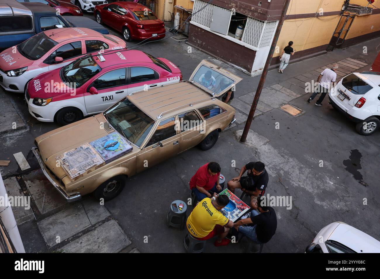 Residents play poleana, a board game invented in prison, in Mexico City ...
