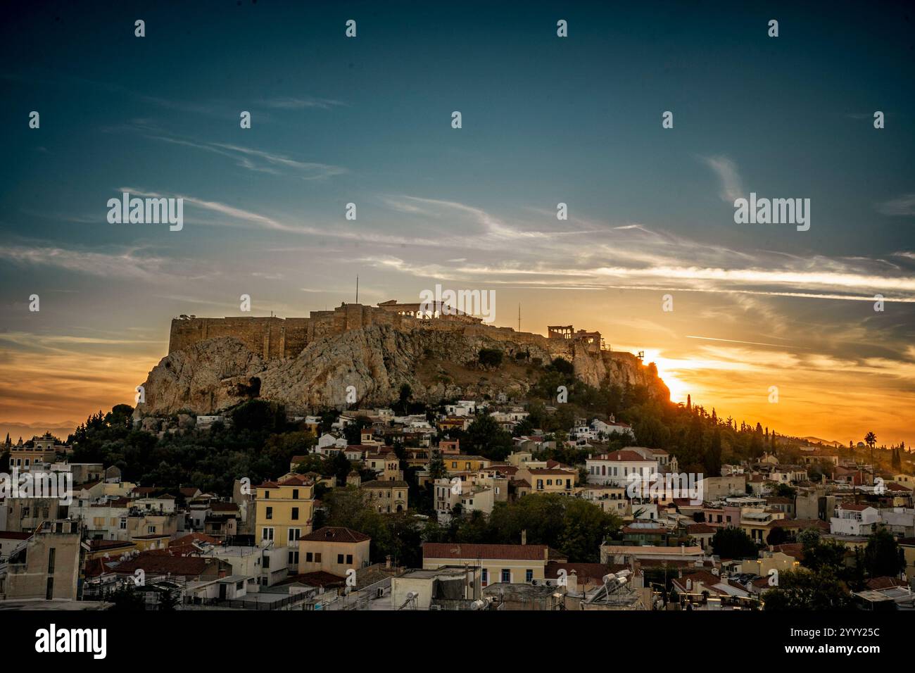 Athens, Attica - GR - Oct 26, 2024 Dramatic sunset over the Acropolis of Athens, an ancient ...
