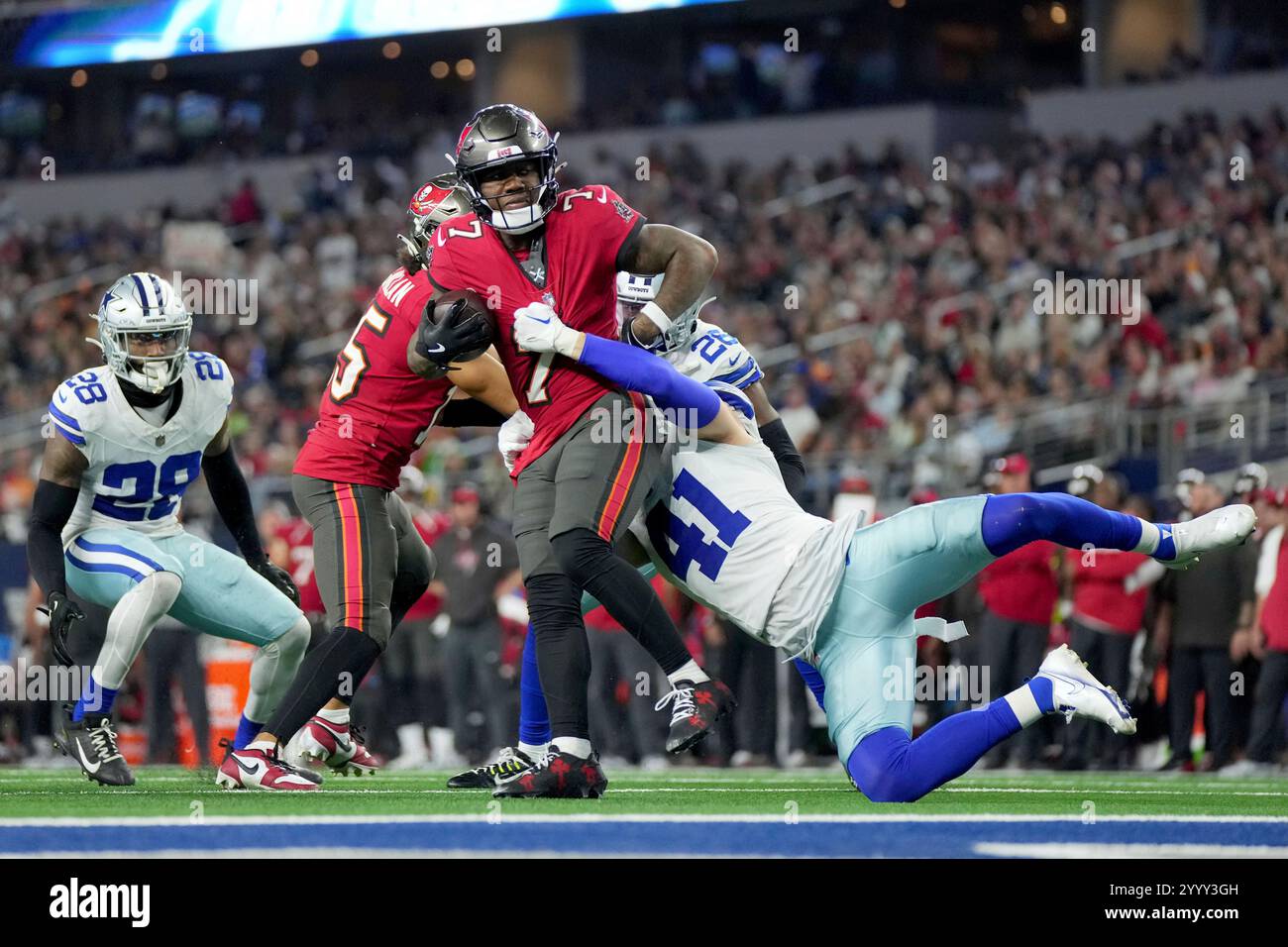 Tampa Bay Buccaneers running back Bucky Irving (7) is stopped by Dallas ...