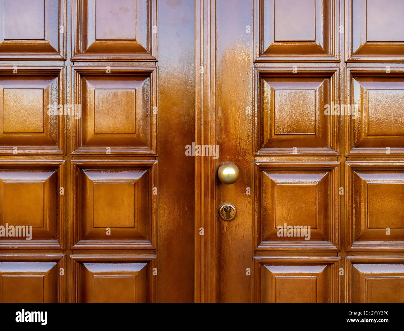 Classic vintage golden brass door knob and keyhole on old and strong of ...