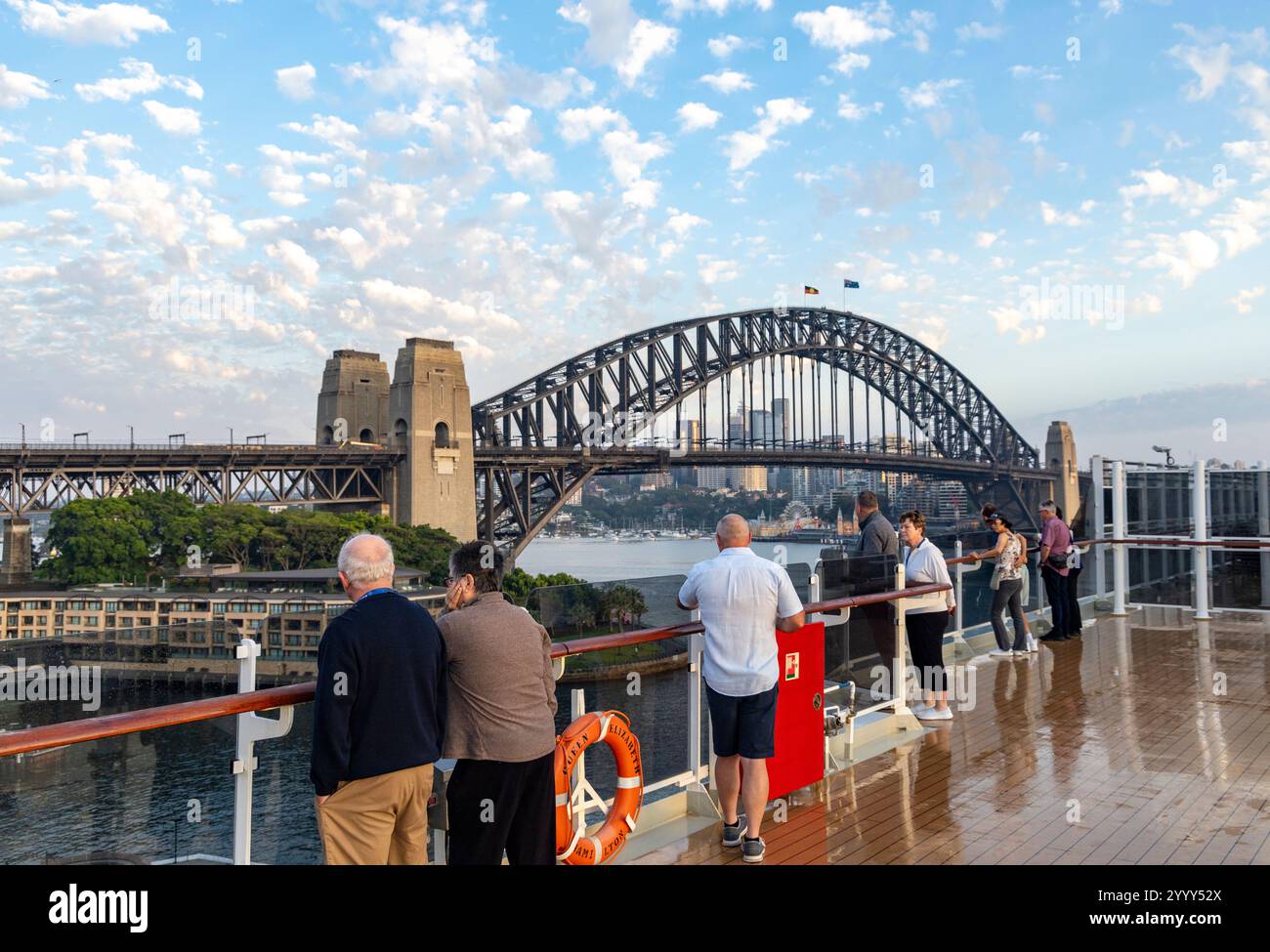 Passengers on the deck of Cunard Queen Elizabeth cruise ship view ...