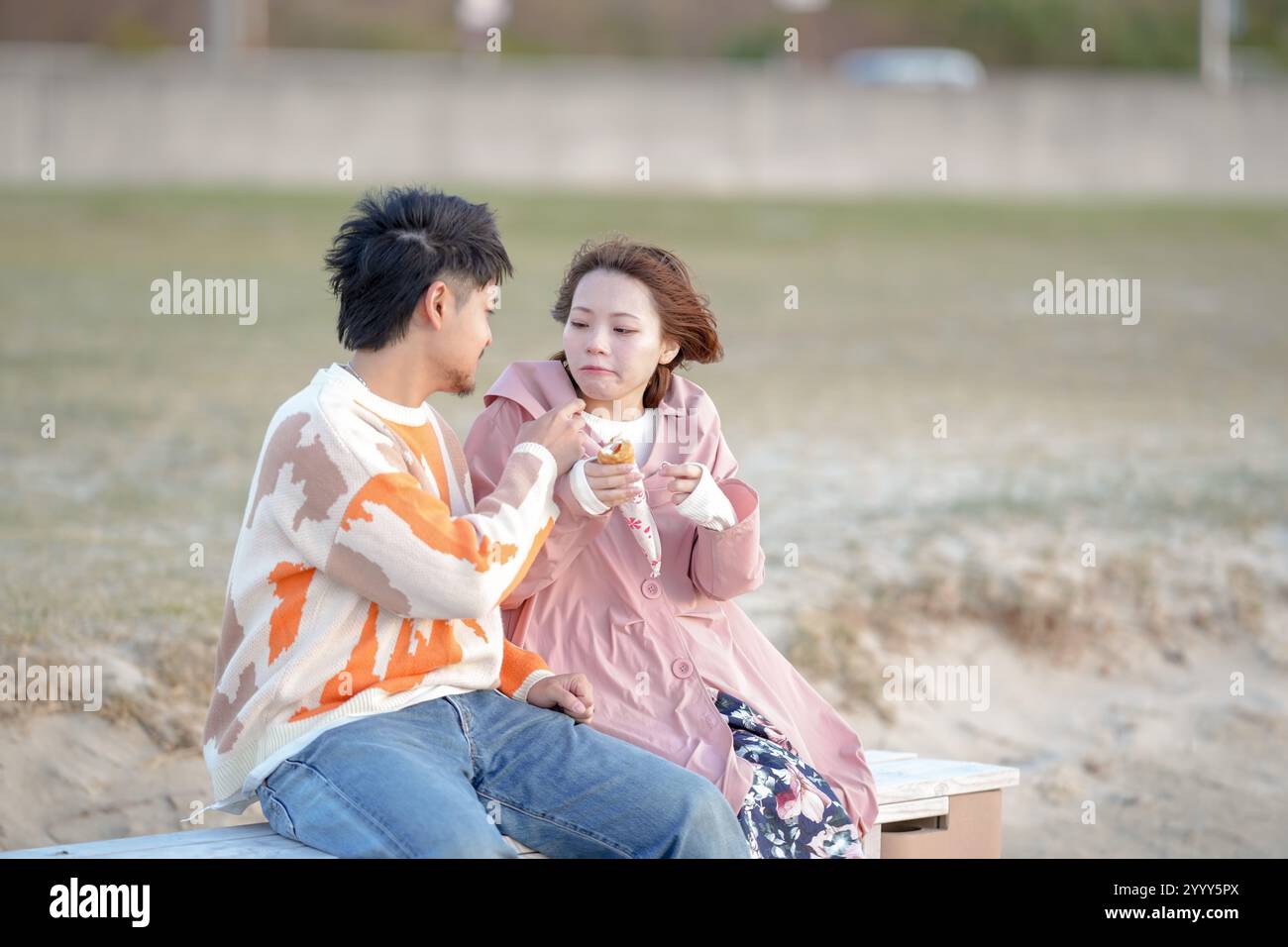 Young couple eating crepes hi-res stock photography and images - Alamy