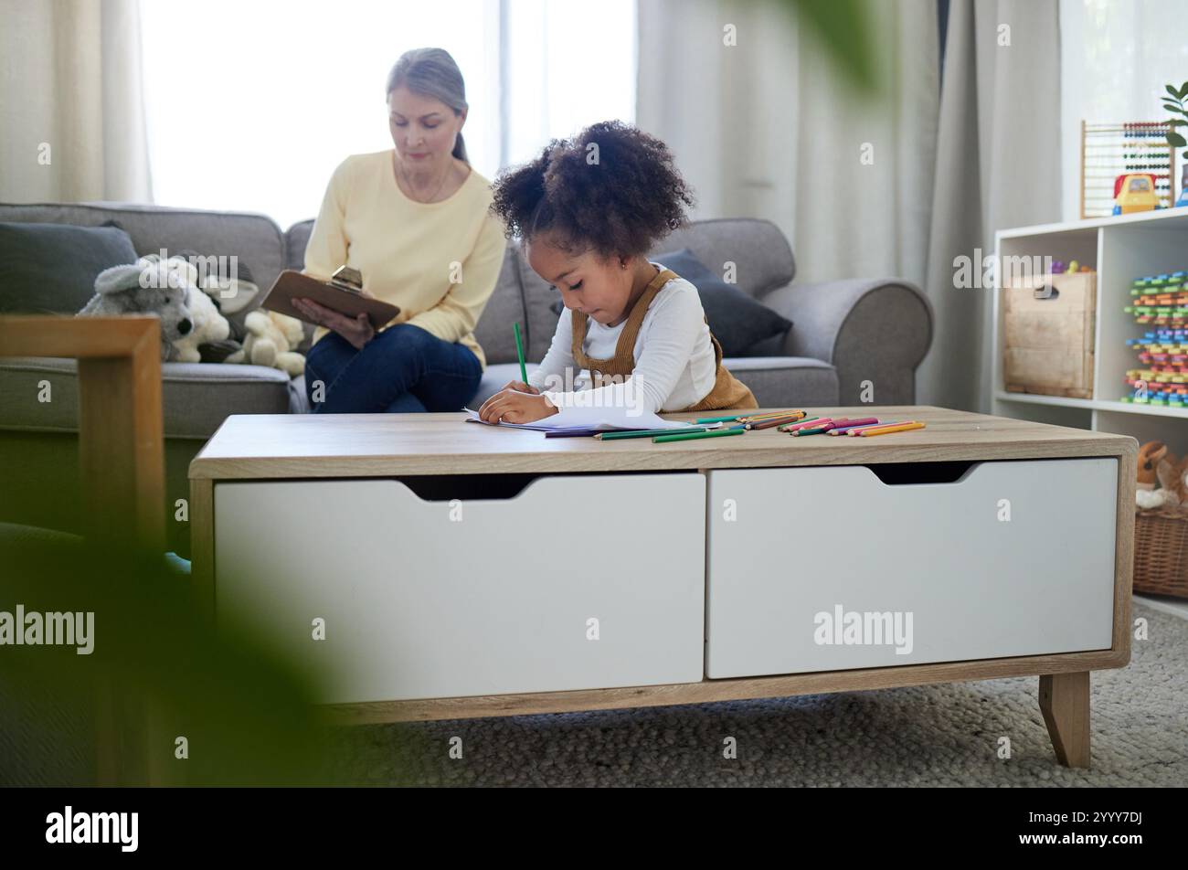 Art therapy, psychologist and drawing with kid in office for trauma ...