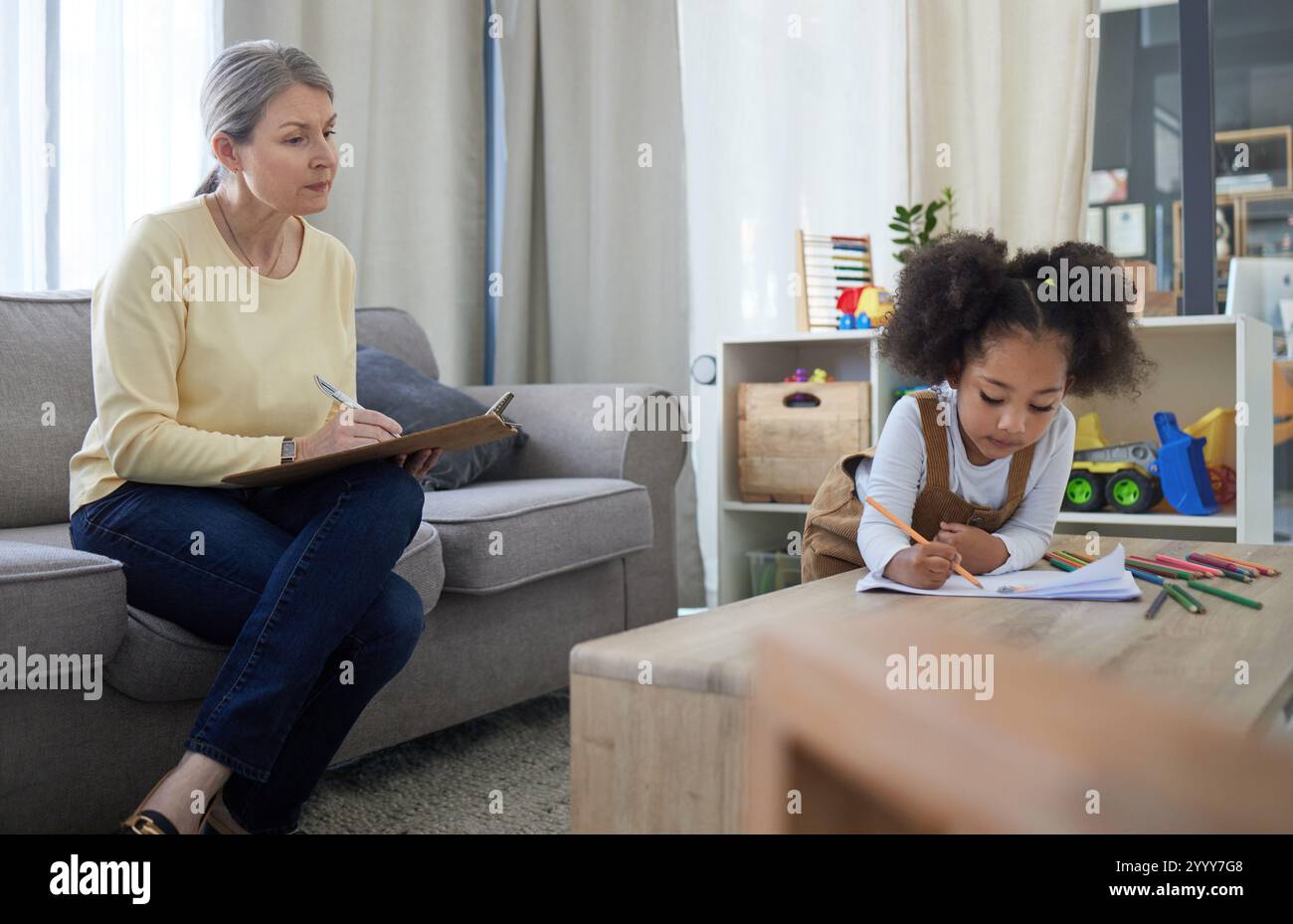 Art therapy, psychologist and counseling with kid in office for trauma ...