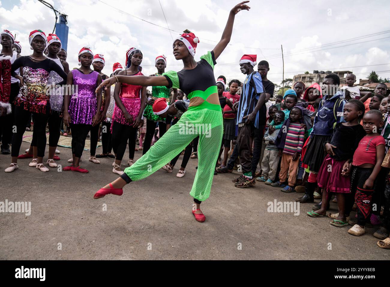 Young dancers perform, during a Christmas ballet event in Kibera slum ...