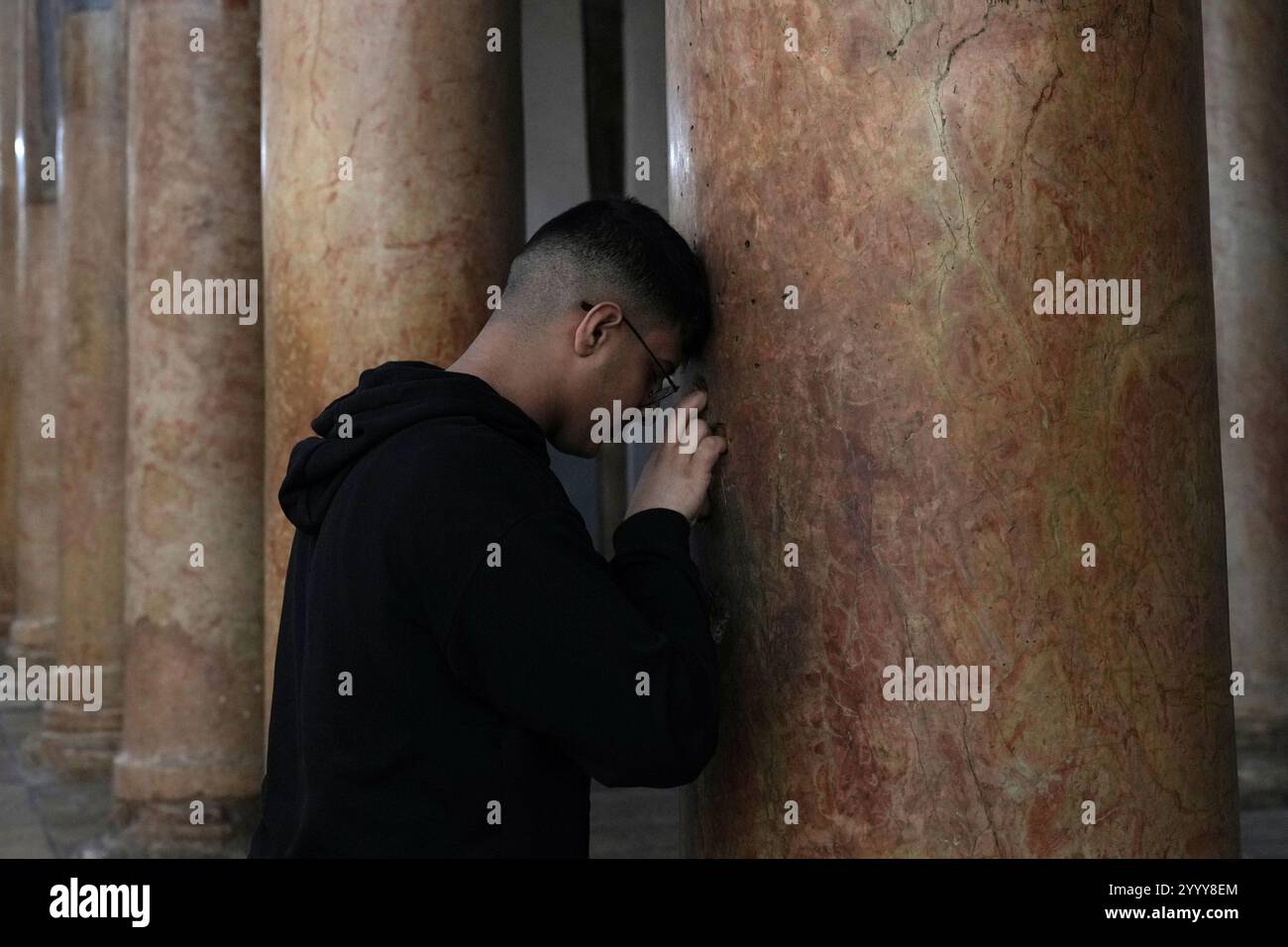 A worshipper visits the Church of the Nativity, where Christians ...