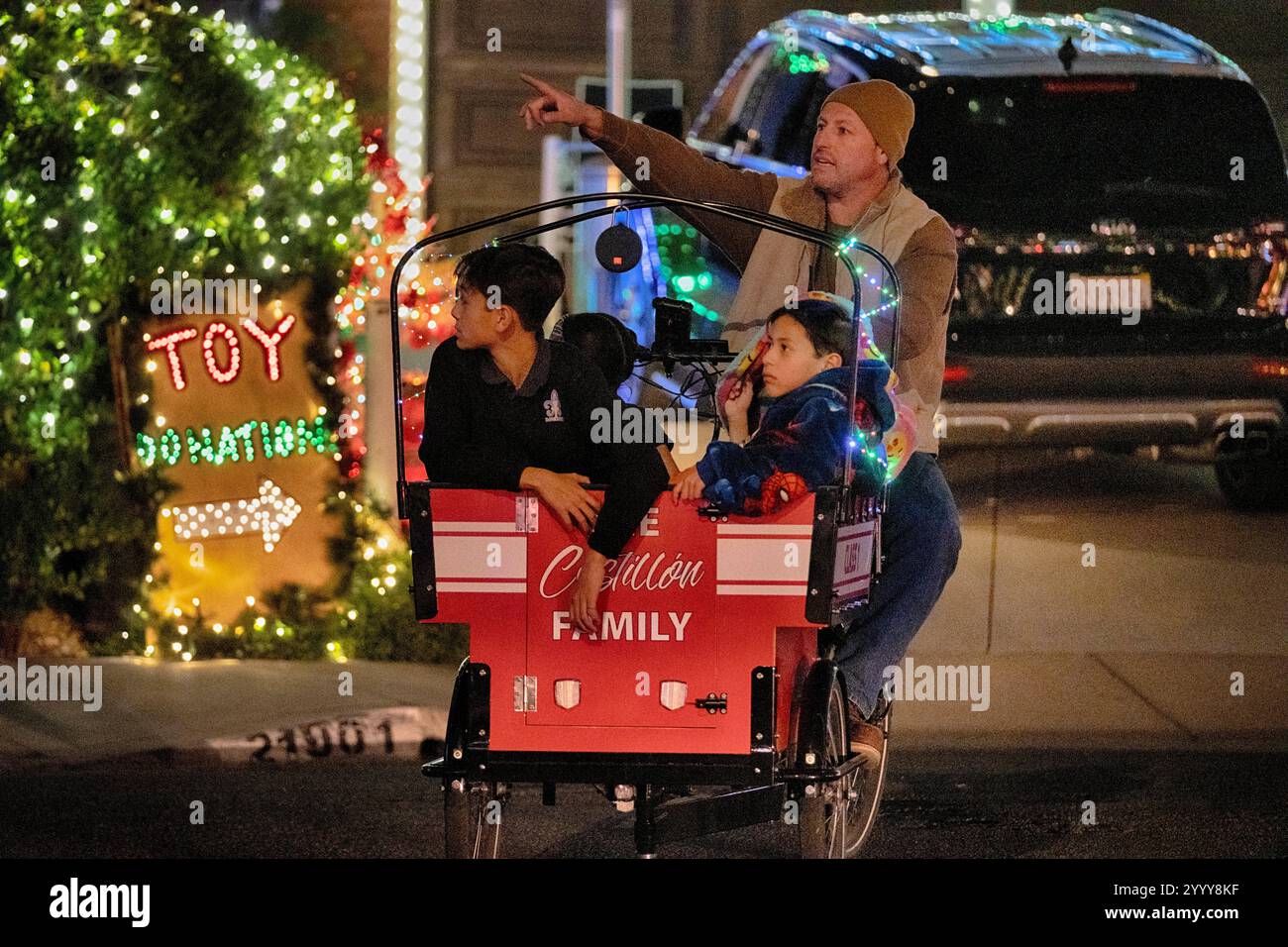 Children are wheeled through the Wakefield Winter Wonderland lighted ...