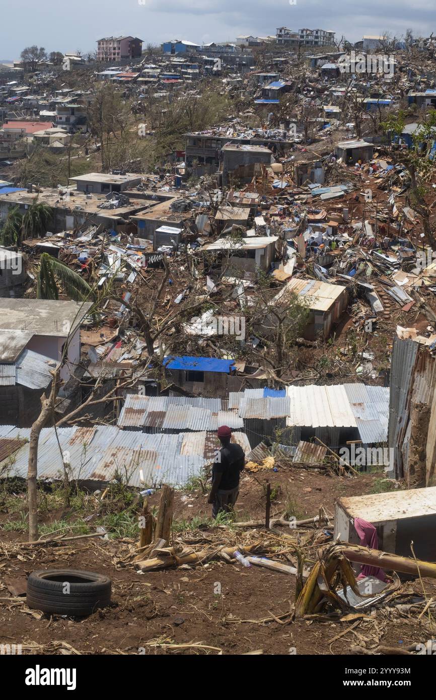 Damaged homes are seen in the slum of Cavani in the heights of ...