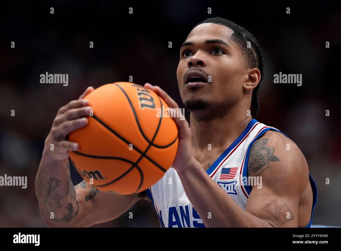 Kansas guard Shakeel Moore shoots during the first half of an NCAA ...