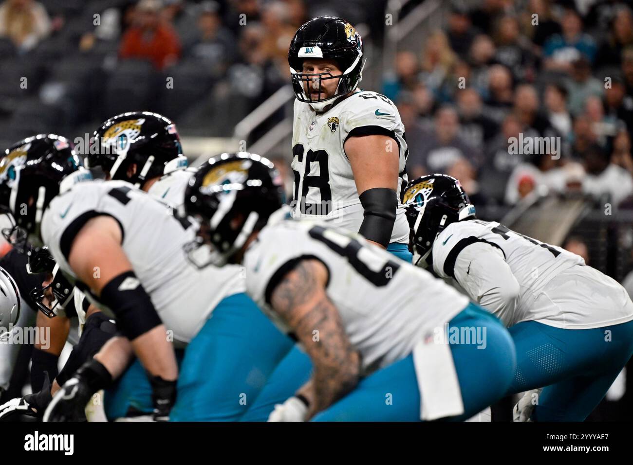 Jacksonville Jaguars guard Brandon Scherff (68) looks over the ...