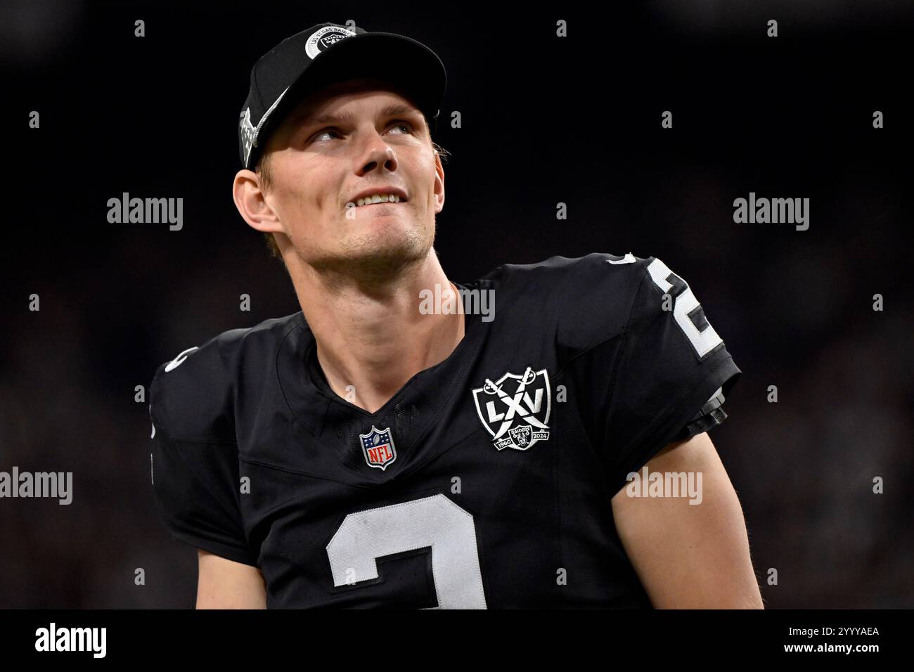 Las Vegas Raiders place kicker Daniel Carlson (2) looks on during an ...