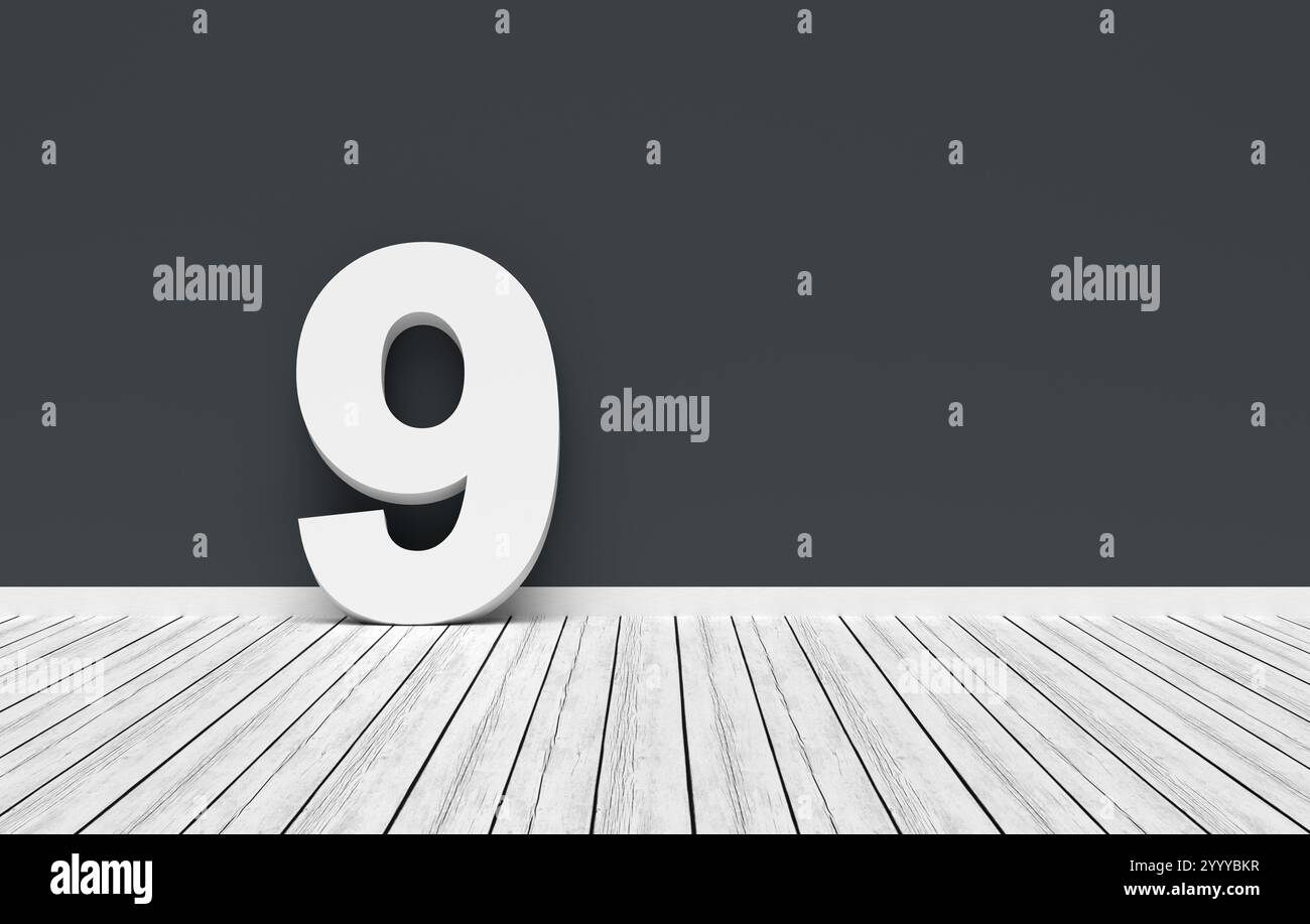 White number nine leaning on a dark gray wall in a white room with ...