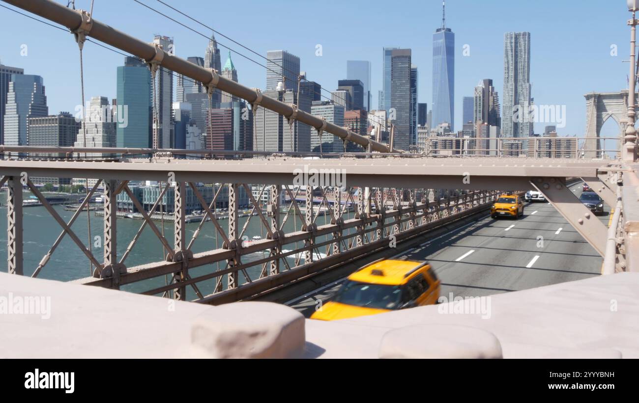 Cars on Brooklyn Bridge. New York City Manhattan downtown skyline ...