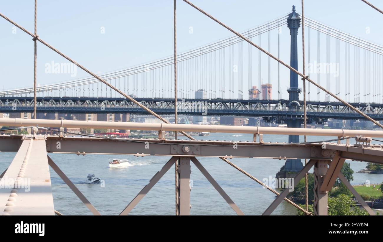 New York City Manhattan Bridge from Brooklyn Bridge view. USA travel ...