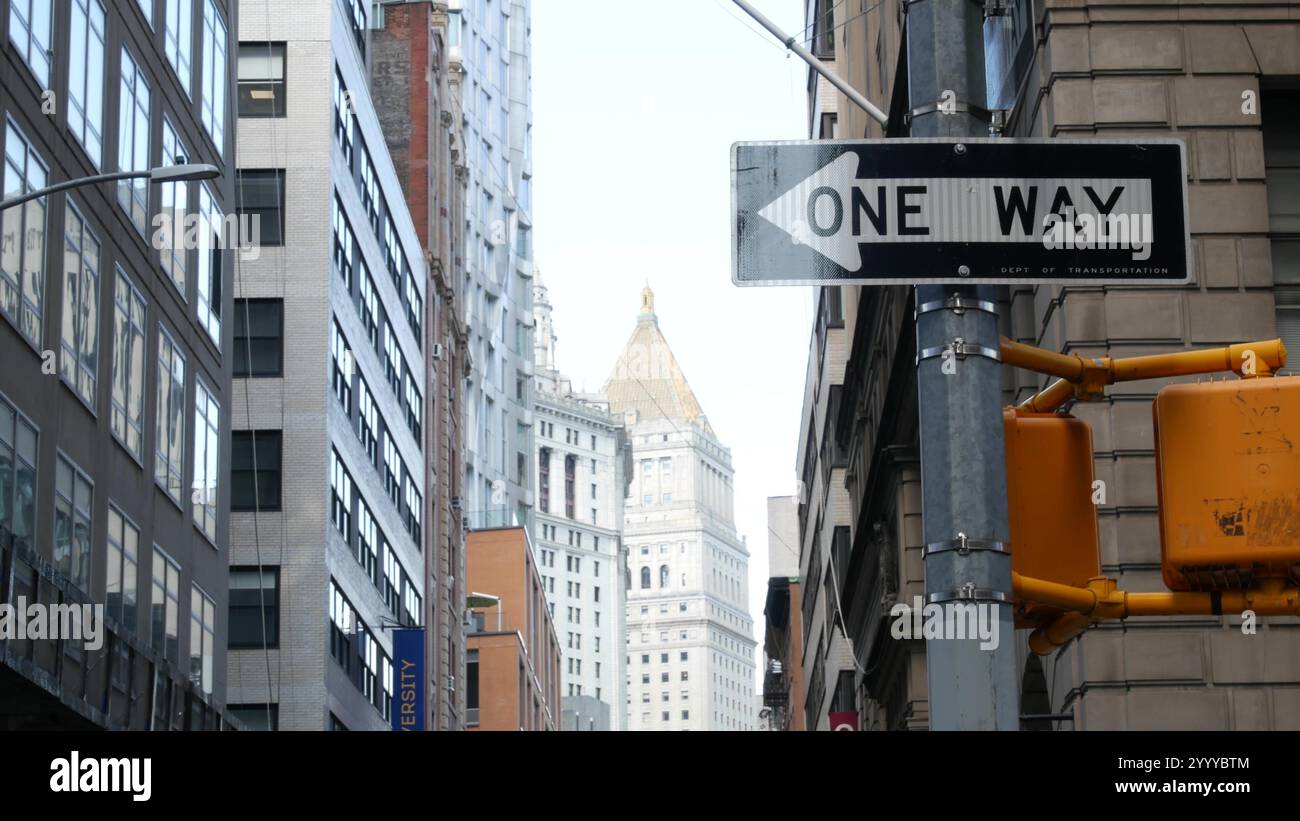 New York City street crossroad, yellow traffic light, oneway transport ...