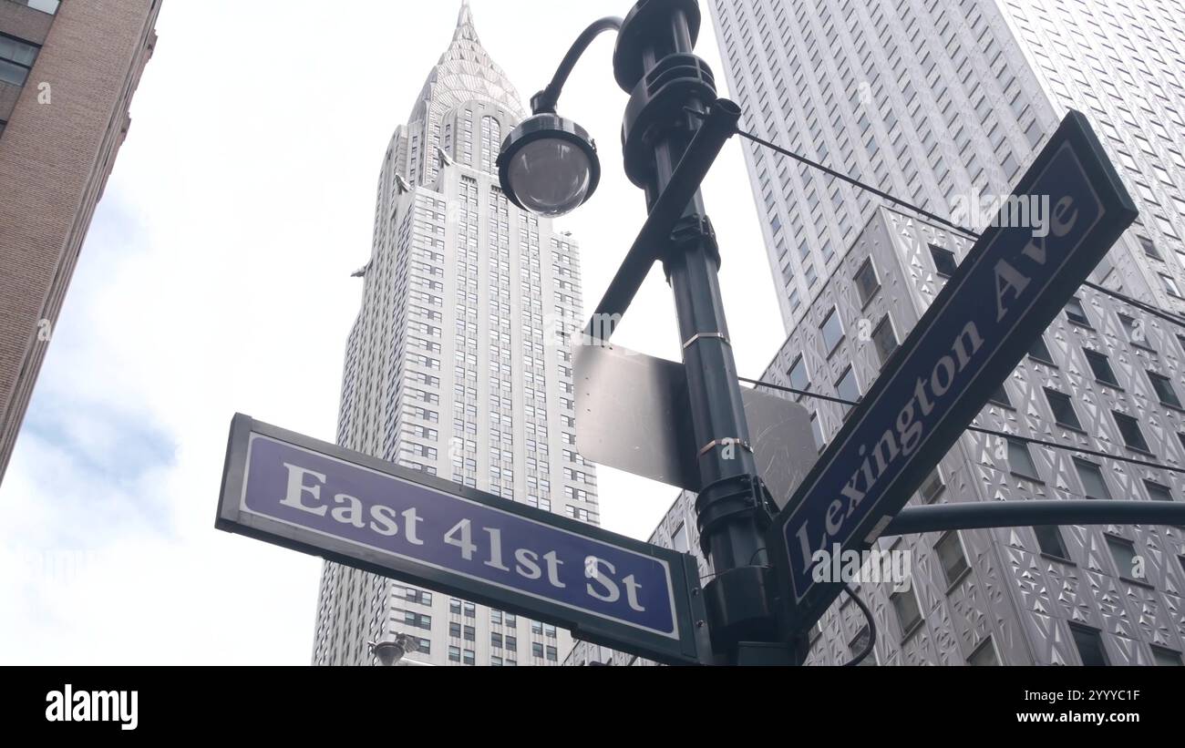 New York City crossroad, street intersection road sign on post ...