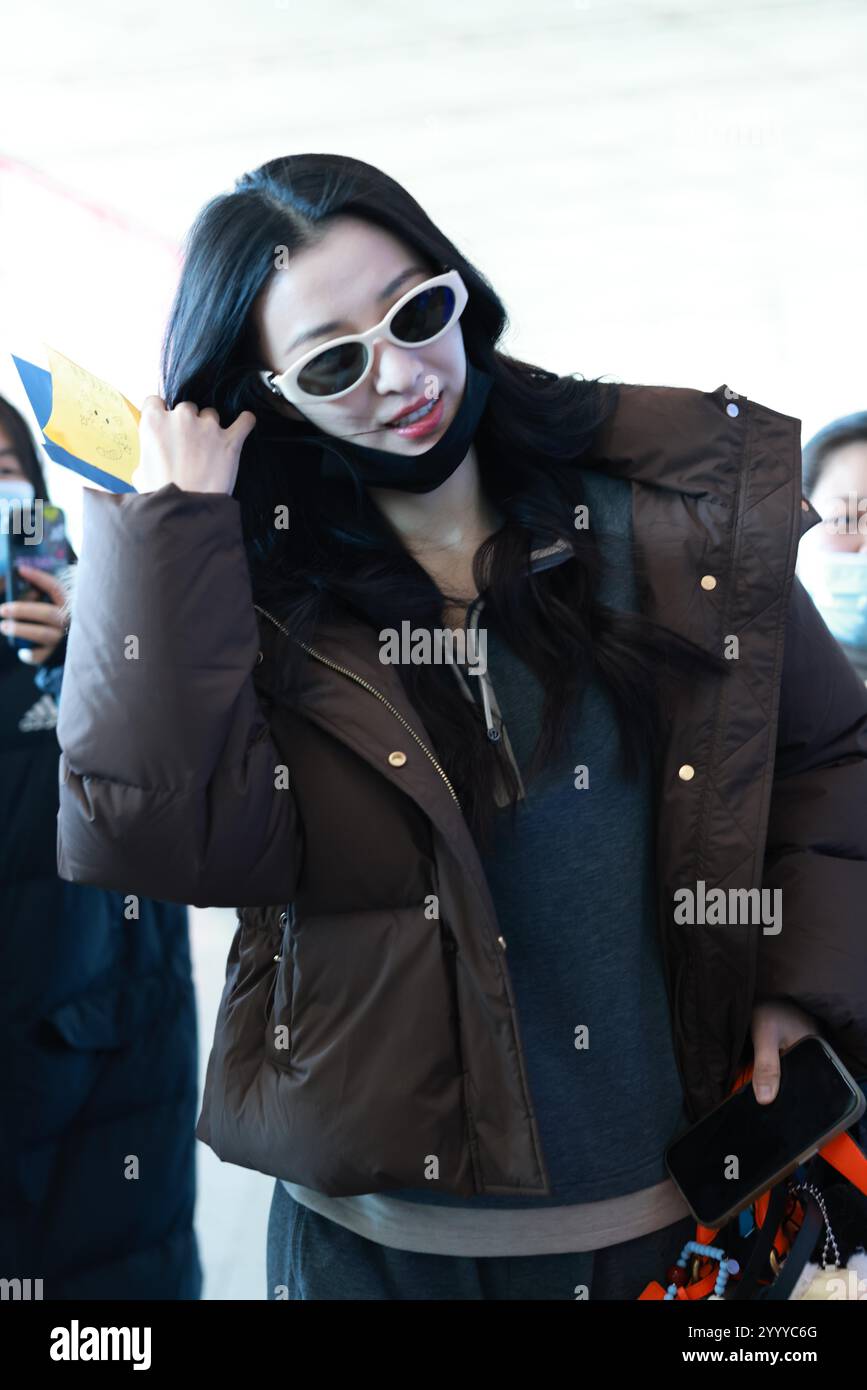 Chinese actress Wang Churan appears at the airport in Beijing, China ...
