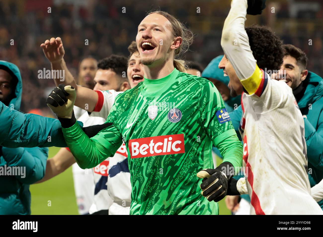 Lens, France. 22nd Dec, 2024. PSG goalkeeper Matvey Safonov celebrates ...