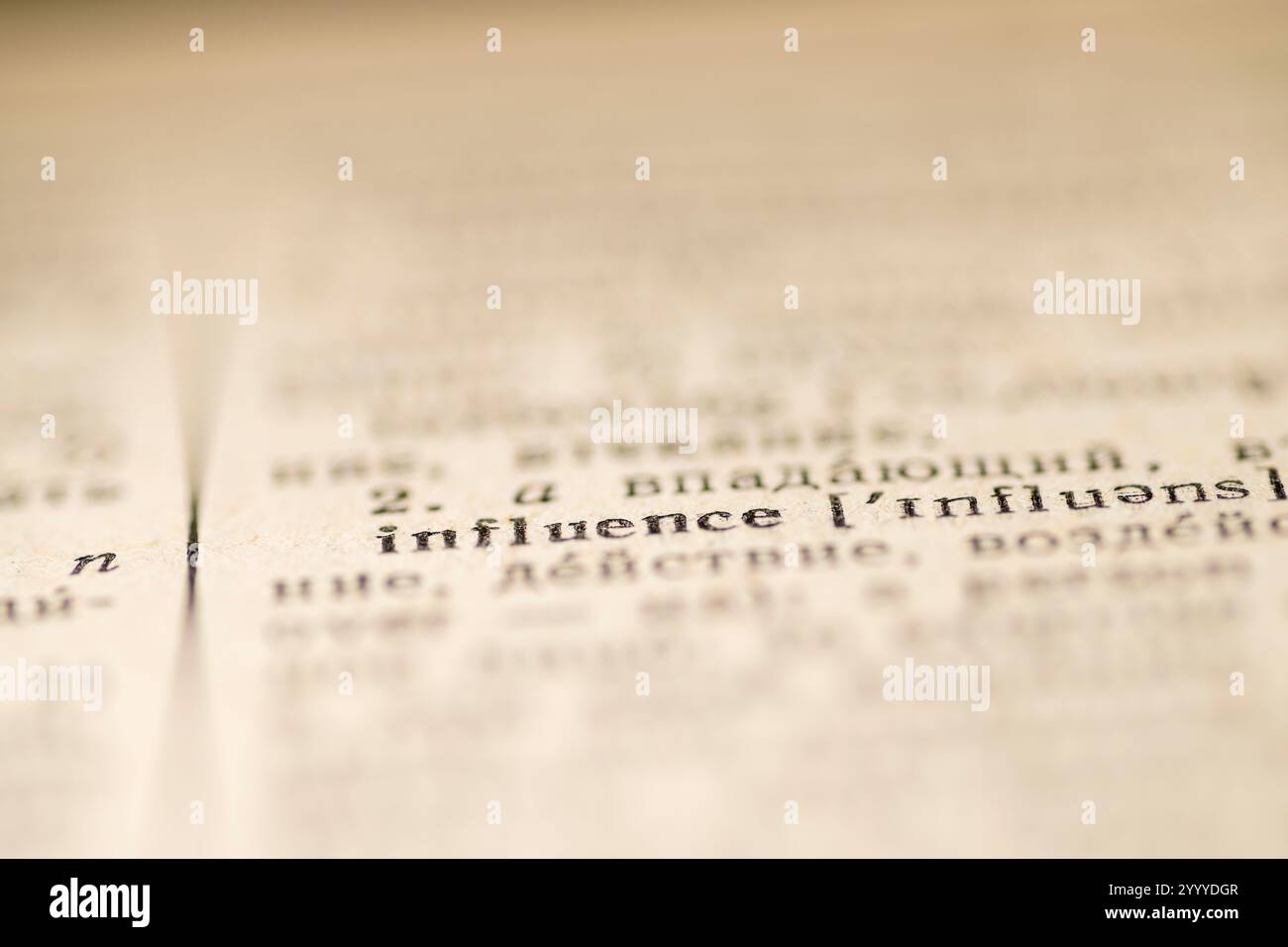 focus on influence word printed inside vintage dictionary Stock Photo ...