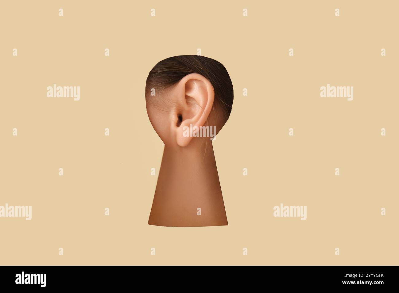 Woman's ear visible through cut beige paper in shape of keyhole. Gossip ...